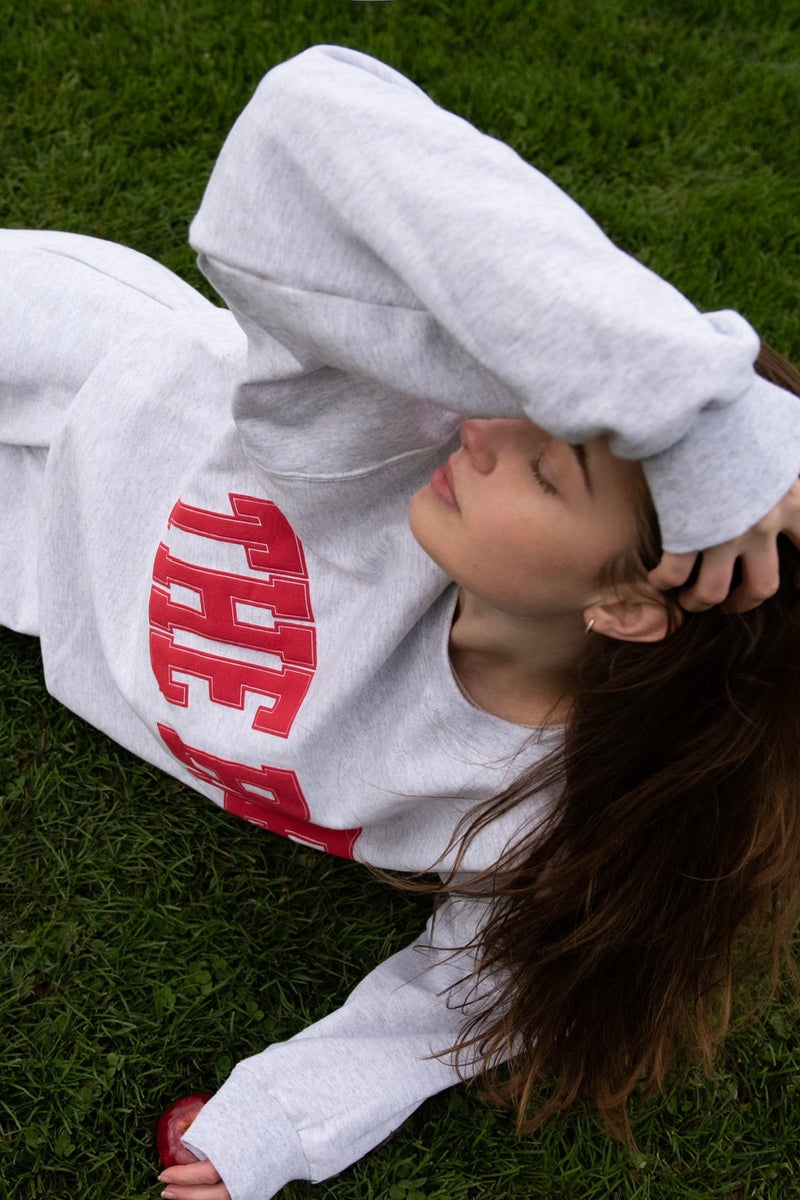 VARSITY SWEATSHIRT LT HEATHER GREY/BIG APPLE RED – The Bar